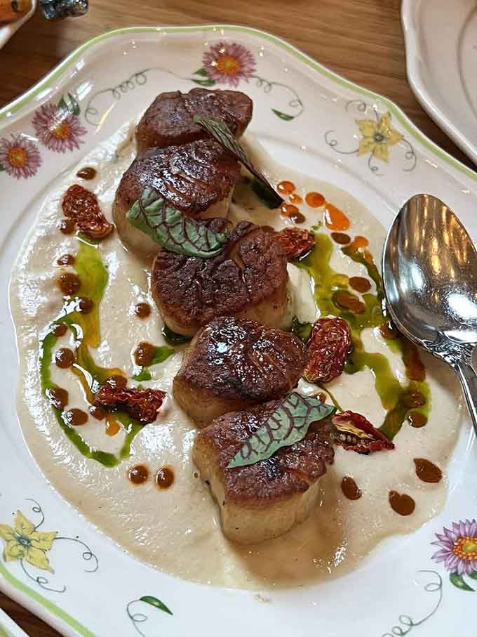 Perfectly seared scallops that look like they're auditioning for a spot in your culinary hall of fame.