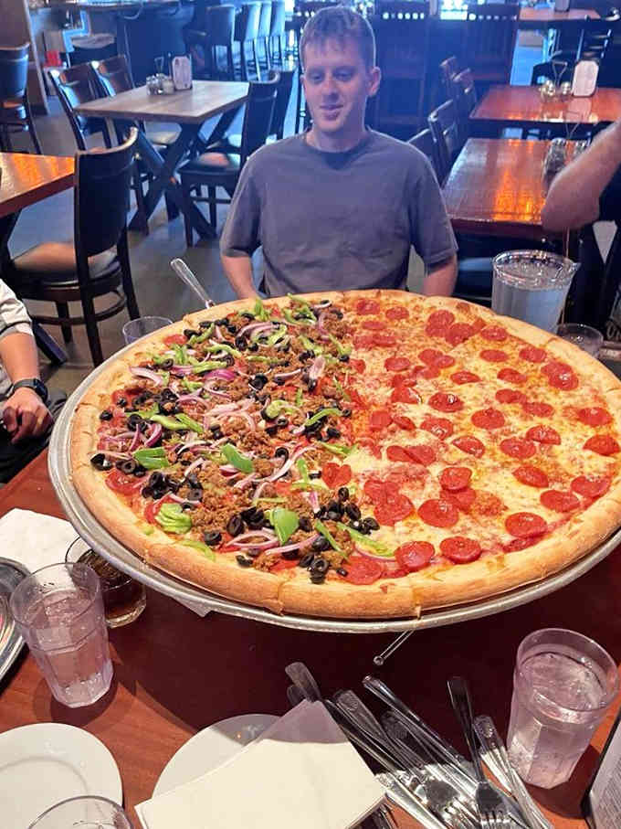 Behold the pizza that launched a thousand regrets about not bringing more friends to help you finish it.