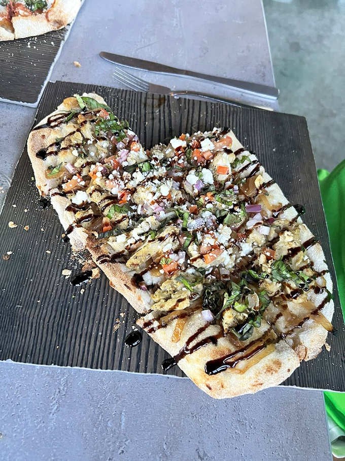 Flatbread topped with fresh ingredients and drizzled with balsamic proves that simple done right beats complicated done wrong every time.