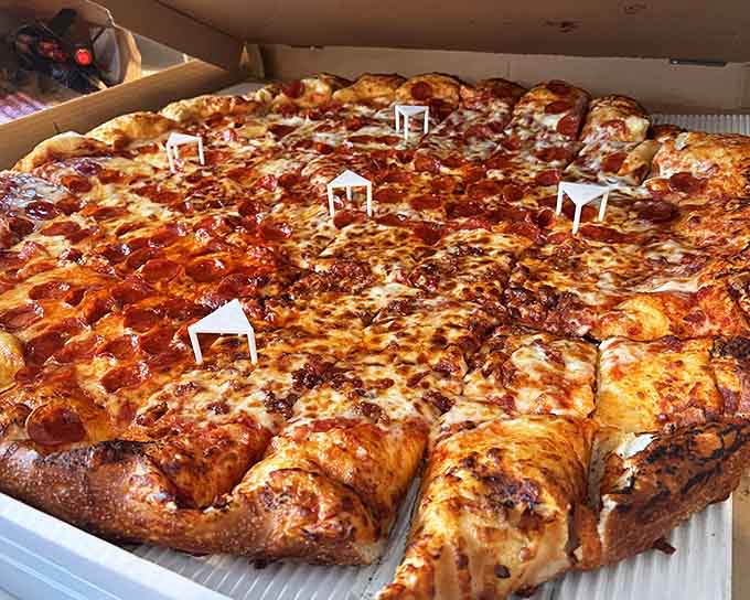 Behold the Tarantosaurus in all its cheesy glory, requiring strategic planning and possibly a forklift to transport home.