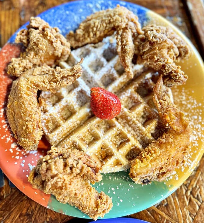 Wings and waffles together create the kind of sweet-savory harmony that makes you question every breakfast choice you've ever made.