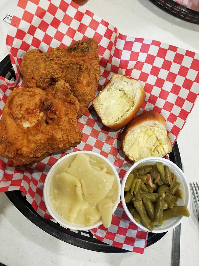 Golden fried chicken with buttery yeast rolls and classic sides&mdash;this is what Sunday dinner dreams are made of.