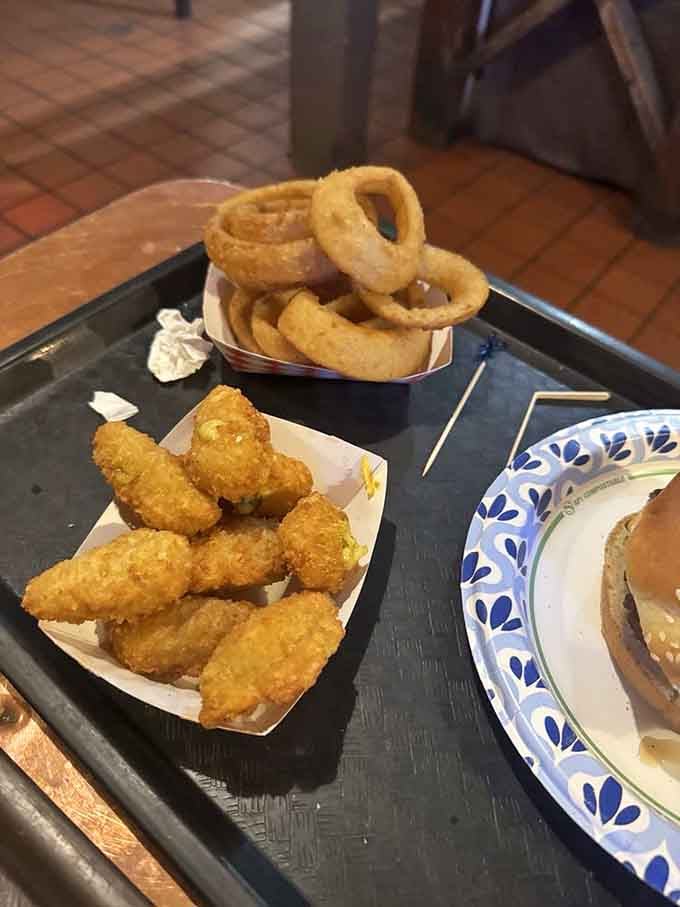 Golden onion rings and jalape&ntilde;o poppers proving that sometimes the best vegetables are the ones you can't recognize anymore.