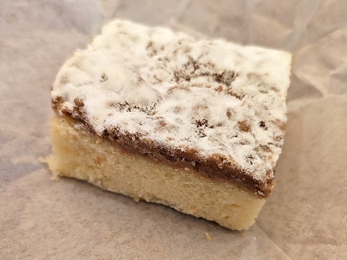 Behold the crumb cake that understands the sacred ratio of crumb to cake better than most marriages understand compromise.