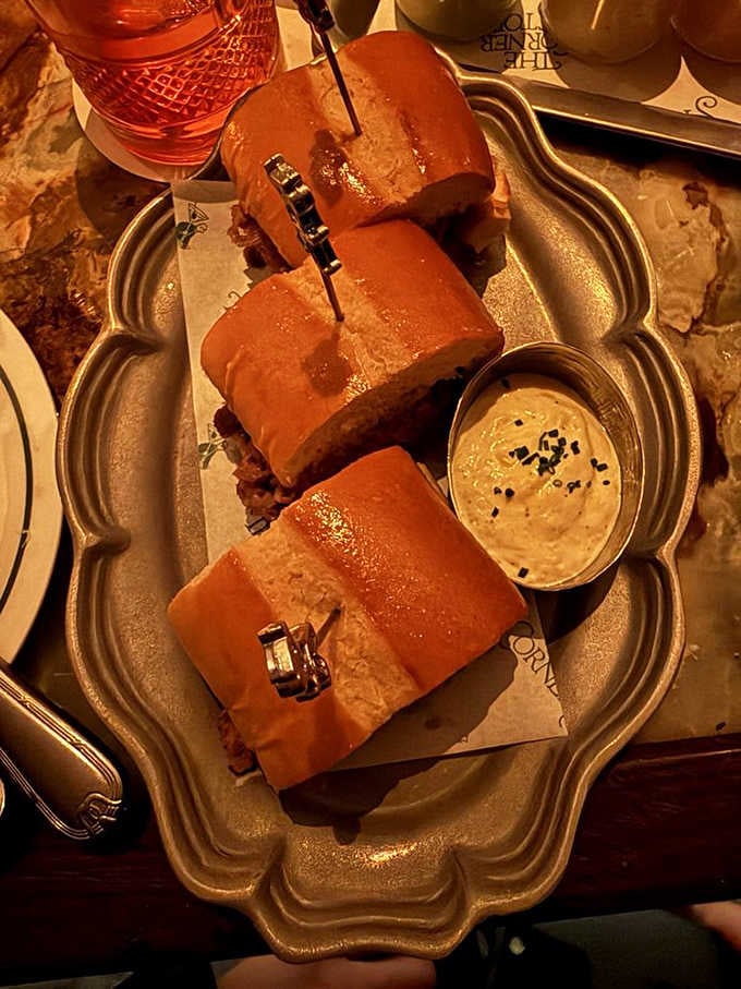 French dip sandwiches arrive like edible treasure chests, golden and glistening, begging to be dunked into rich jus.