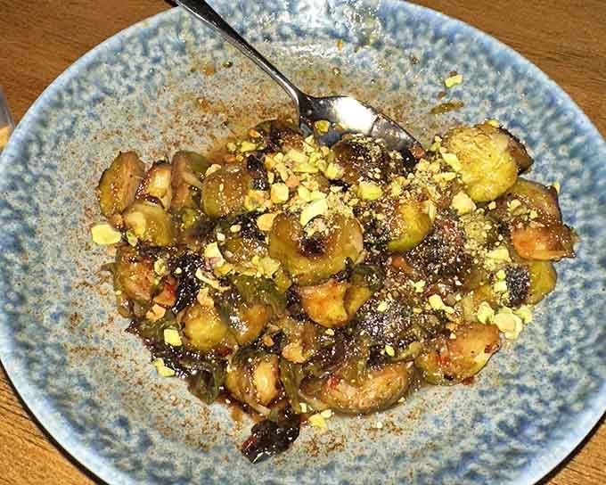 Brussels sprouts get the glow-up they deserve with pistachios and pomegranate creating pure vegetable magic here.