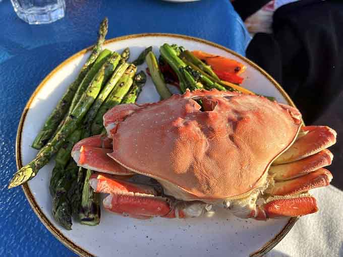 Dungeness crab with asparagus proves that sometimes the simplest presentations are the most stunning dinner companions.