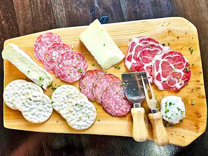 Democracy in action: you pick the cheeses, the meats, the accompaniments, and nobody judges your choices.