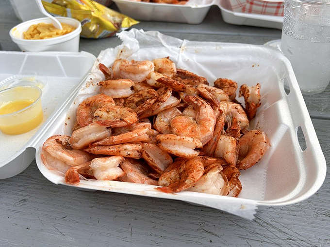 Steamed shrimp piled high in a styrofoam container: sometimes the simplest presentations deliver the most spectacular flavors.