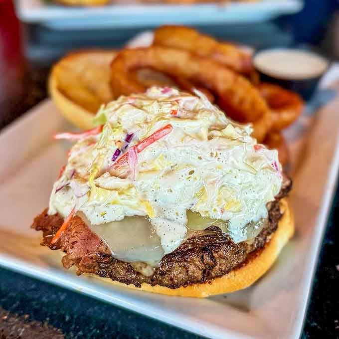 The Pastrami Burger arrives like it's auditioning for a food magazine cover, and it's getting the part.