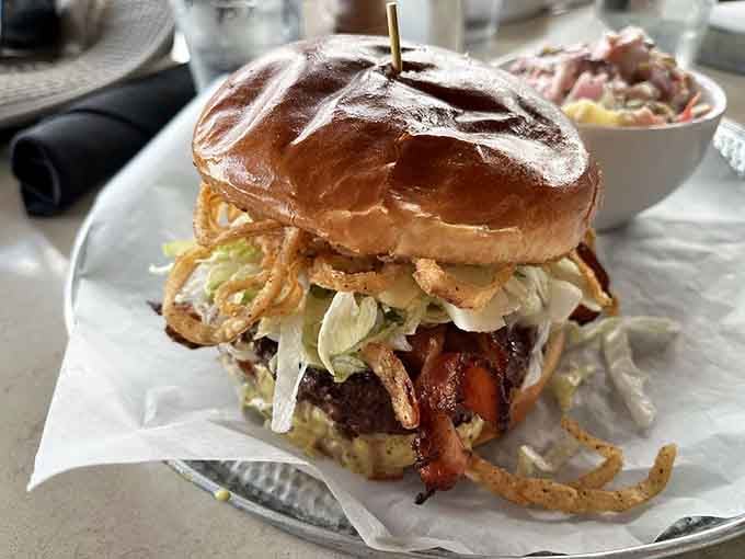 That Bison Burger towers with crispy onions like a delicious skyscraper you'll happily demolish one bite at a time.