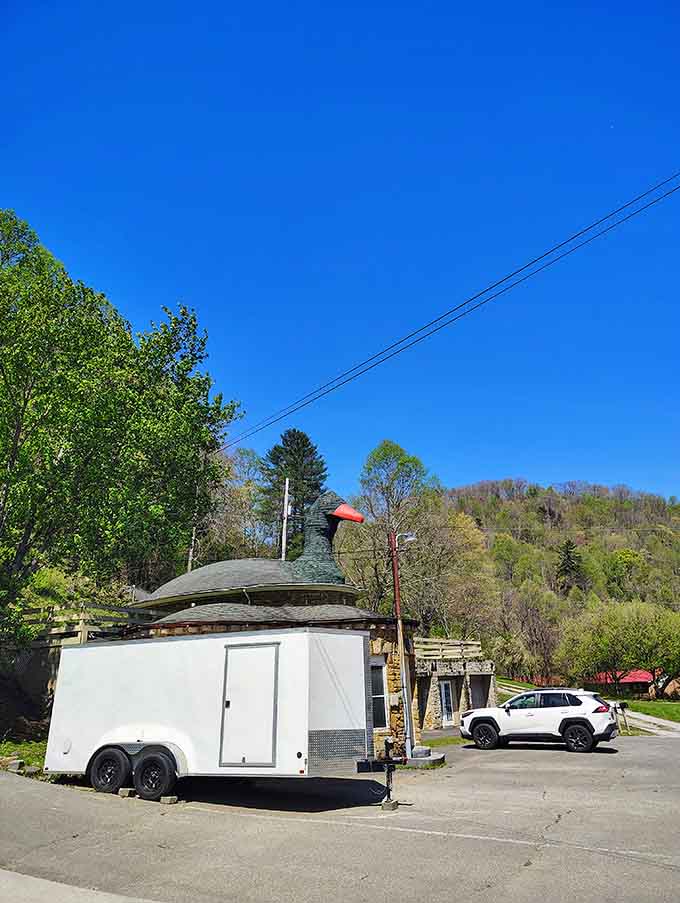 Even utility trailers stop to admire this roadside wonder that defies all conventional building codes.