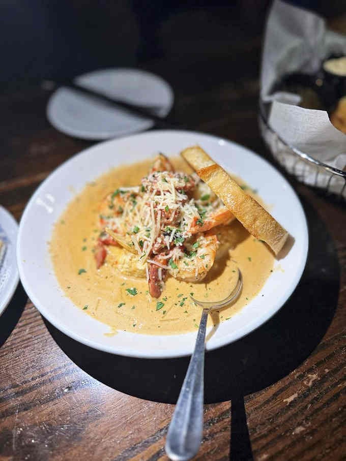Plump shrimp swimming in velvety sauce with crusty bread for sopping, this is Low Country cooking at its finest.
