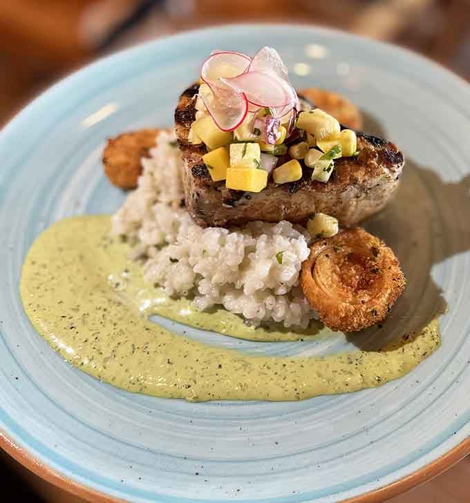 Grilled swordfish so perfectly plated it deserves its own Instagram account, and yes, that's cauliflower puree stealing the show.