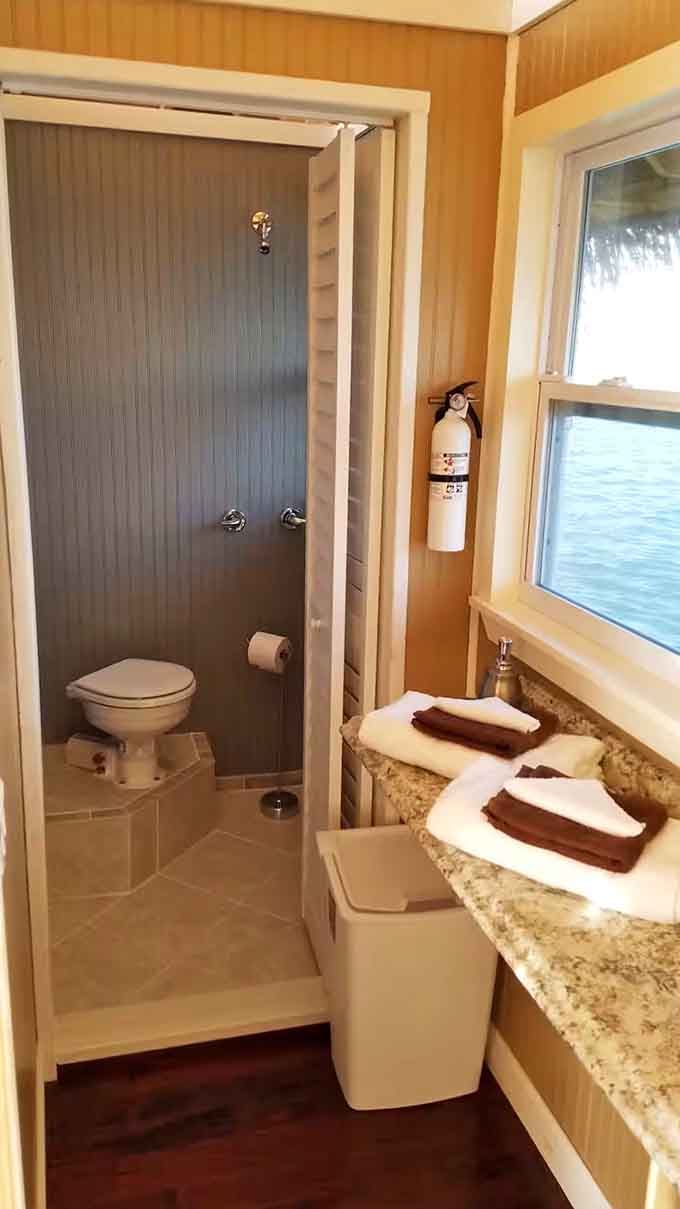 Even the bathroom gets ocean views here, proving that luxury really is in the thoughtful details.