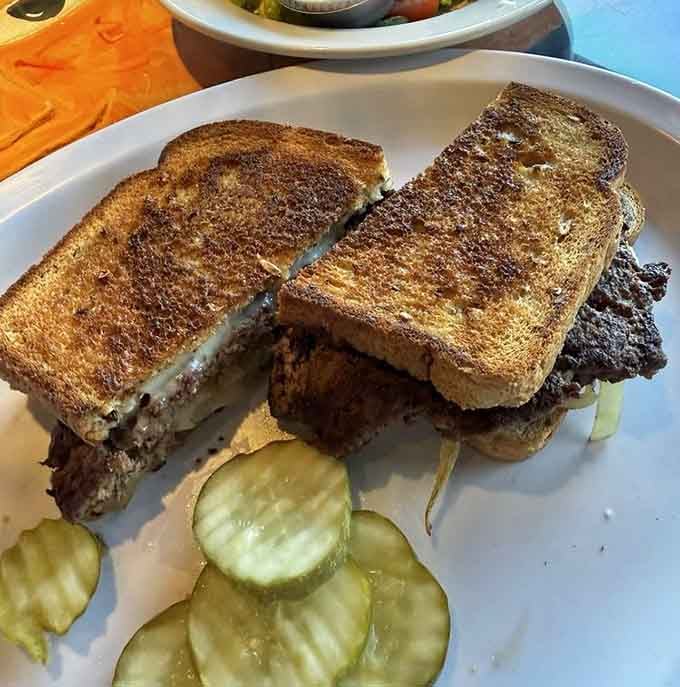 This patty melt means business, served with pickles that provide the perfect tangy counterpoint to all that melted goodness.