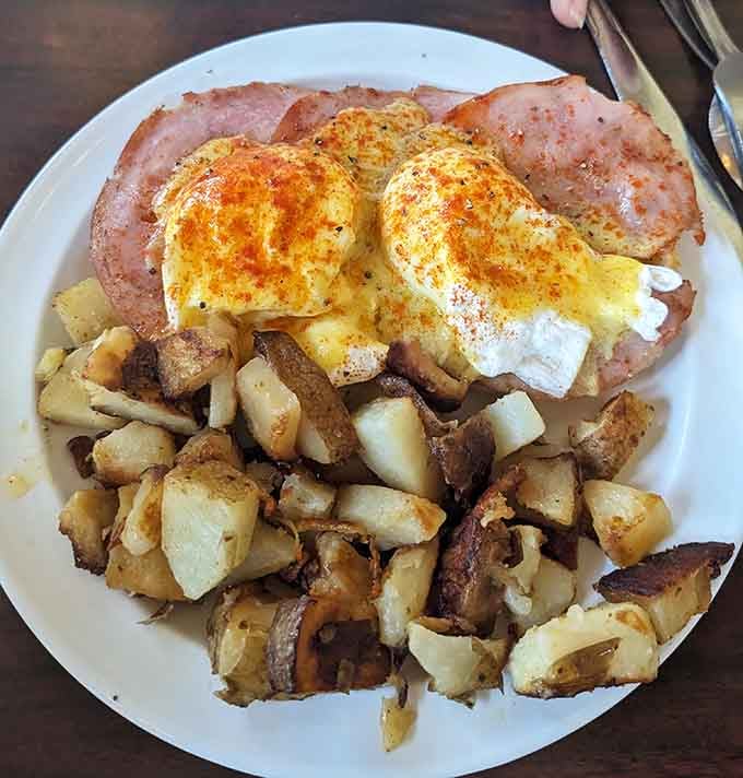 Golden eggs, crispy hash browns, and bacon that knows its purpose, this is breakfast doing all the heavy lifting.