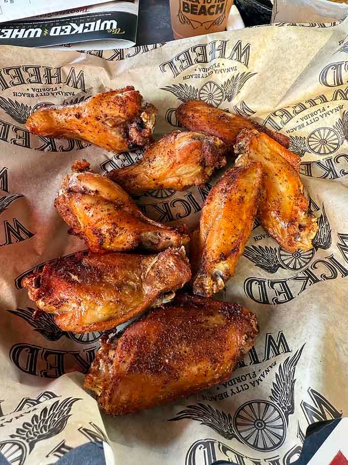 These wings have that perfect golden-brown color that tells you someone in the kitchen knows exactly what they're doing.