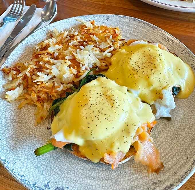 Eggs Benedict done right, with hollandaise that would make Julia Child nod approvingly from heaven.