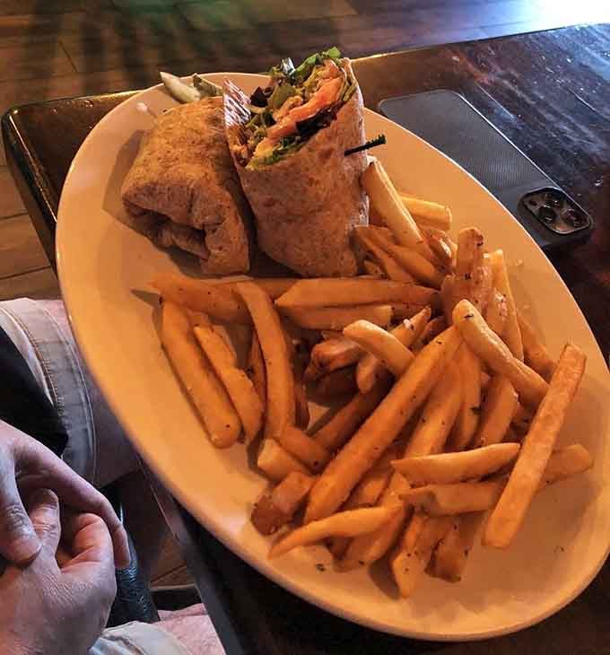 That chicken wrap comes loaded with fresh ingredients and enough fries to share, or not, we won't judge.