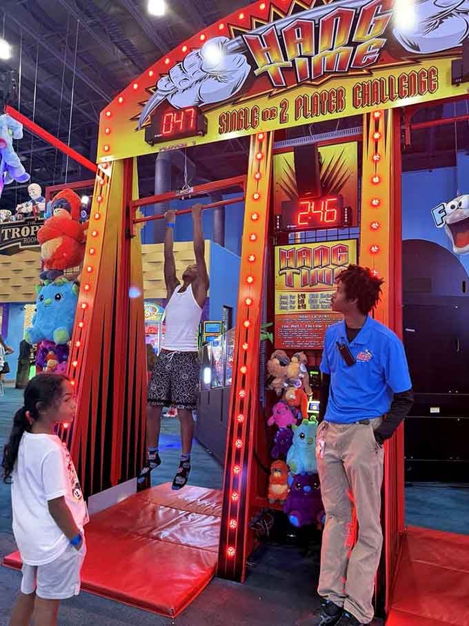 Hang Time challenges your upper body strength while everyone watches, because nothing says fun like public displays of athletic struggle.