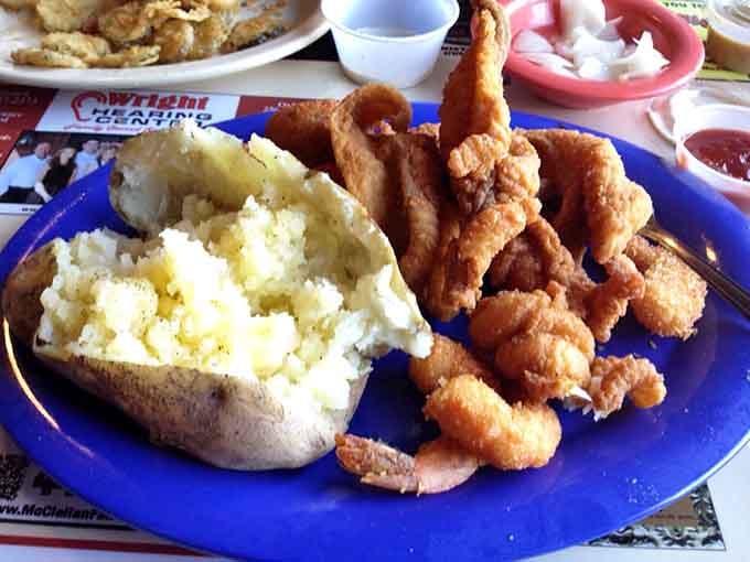 Golden catfish meets plump shrimp on a plate that understands exactly what comfort food should look like always.