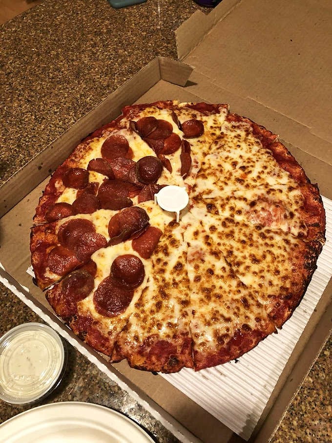Half pepperoni, half cheese proves that sometimes the best solution is simply having it both ways, my friends.