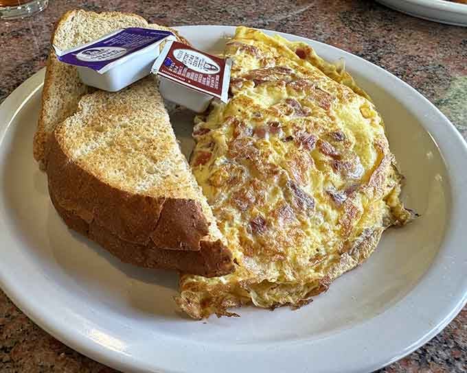 That golden omelet looks like it could solve most of life's problems, or at least make you forget them temporarily.