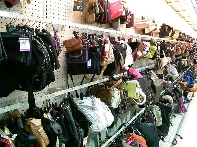 Every purse has a story, and somewhere in this wall of bags is your next favorite accessory waiting.