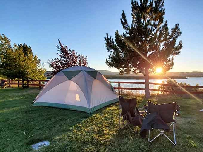 Your tent with a lakeside view beats any hotel room, especially when the sunrise comes free with your stay.