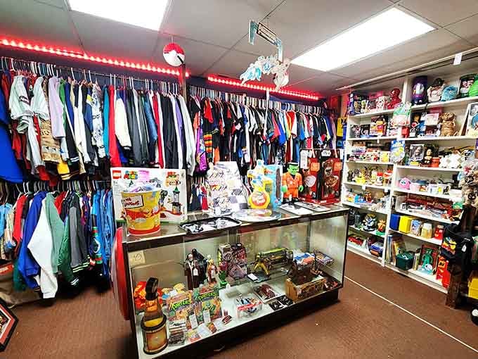 Rows of vintage clothing hang like a rainbow of fashion history, ready for their second act.