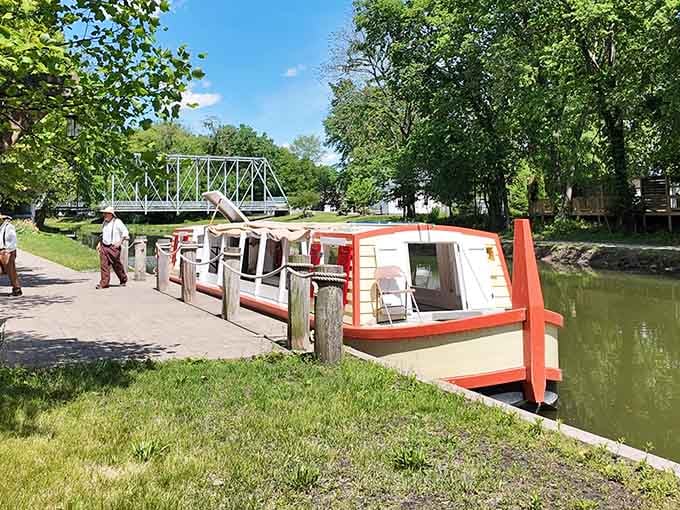 The canal boat waits patiently, ready to transport you back when horsepower meant actual horses.