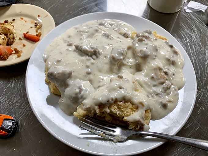 Behold the star of the show: biscuits drowning in sausage gravy that'll make you forget your name.