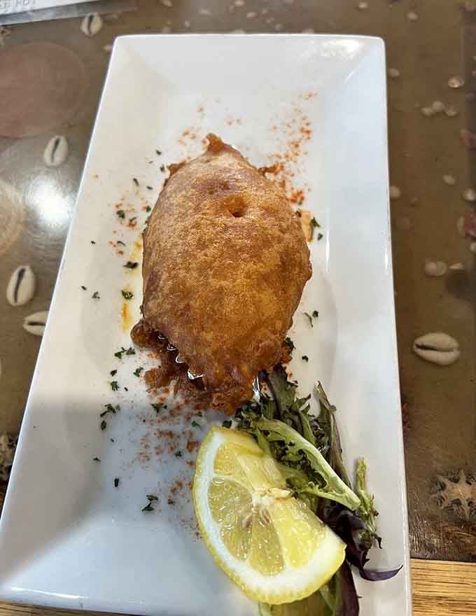 Behold the golden-fried soft shell crab, crispy perfection that'll make you forget every other meal you've ever eaten.