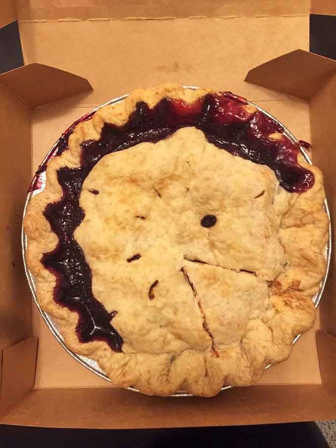 Behold the marionberry masterpiece, its golden crust barely containing the purple treasure within like edible jewelry.