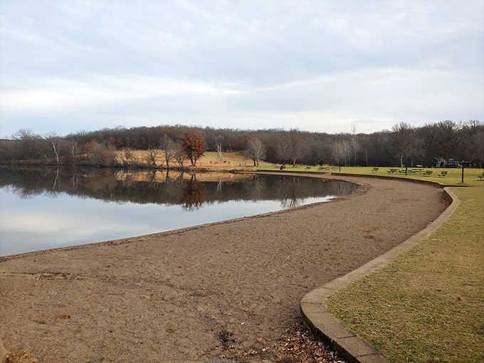 The swimming beach on a quieter day, patiently waiting for summer crowds to return and splash around.