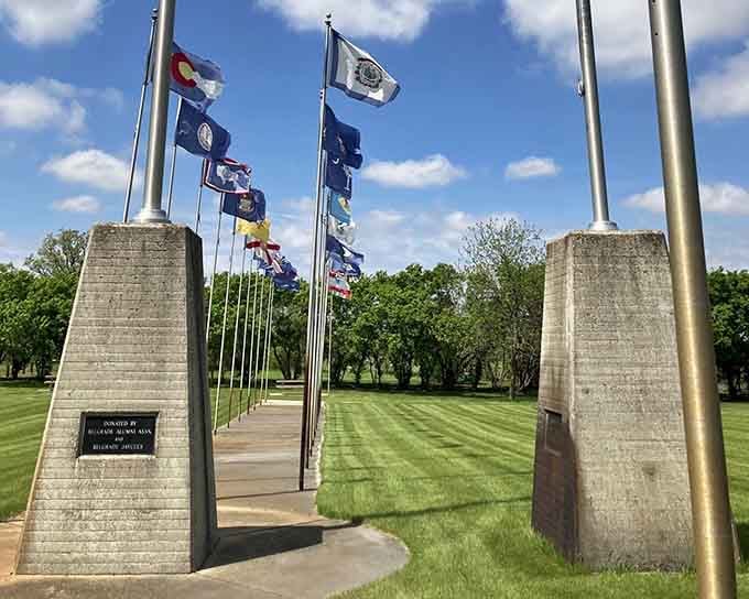 A patriotic pathway lined with flags leads you toward the crow, making this feel like America's quirkiest pilgrimage.
