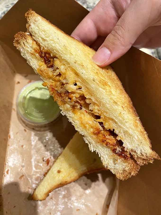 Golden, crispy perfection meets melted cheese in a grilled sandwich that'll make you rethink everything you thought you knew about lunch.