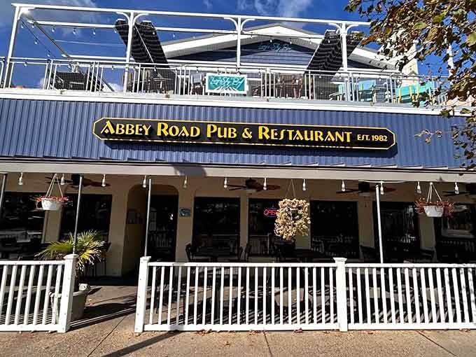 That rooftop deck with Beatles vibes proves the best music pairs perfectly with ocean breezes and cold drinks.