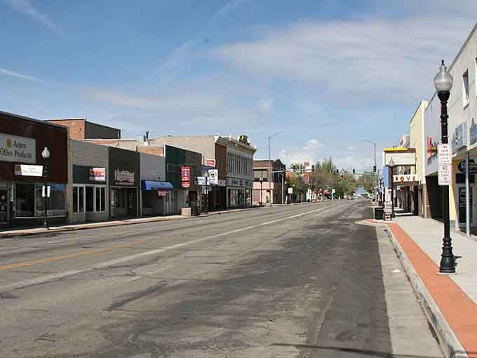 Wide-open main street stretches toward distant horizons, offering breathing room your retirement budget will genuinely appreciate.