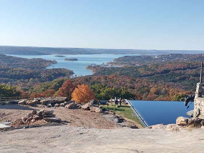 Autumn's paintbrush transforms the hillsides into a masterpiece, while the lake below mirrors every spectacular shade of fall.