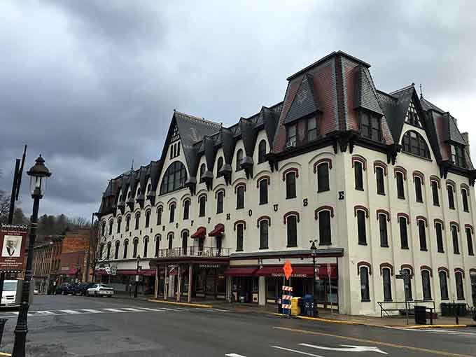 This grand Victorian building stands like a wedding cake in architectural form, dramatic even under moody skies.