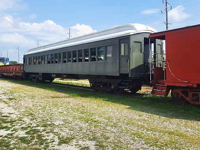 Notice how the afternoon sun catches those windows, making this classic railcar shine like it's waiting for passengers.