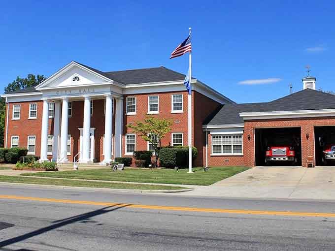 Those grand white columns say "important building" louder than any sign ever could, standing proud on Main Street.
