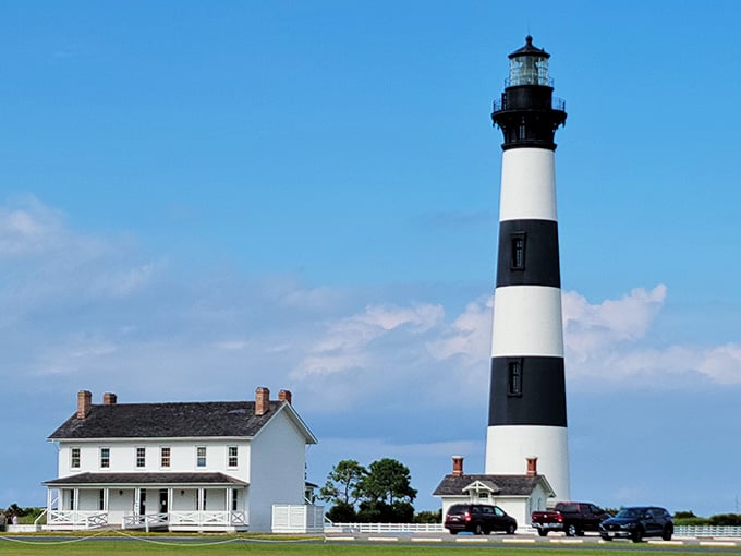 The classic black and white bands make this lighthouse look like it's wearing a perfectly tailored nautical uniform.