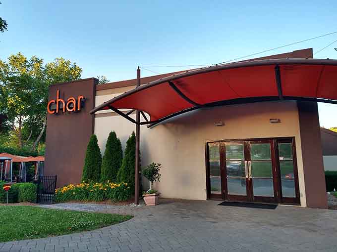 That dramatic curved awning shelters the doorway to contemporary steakhouse excellence with serious style.