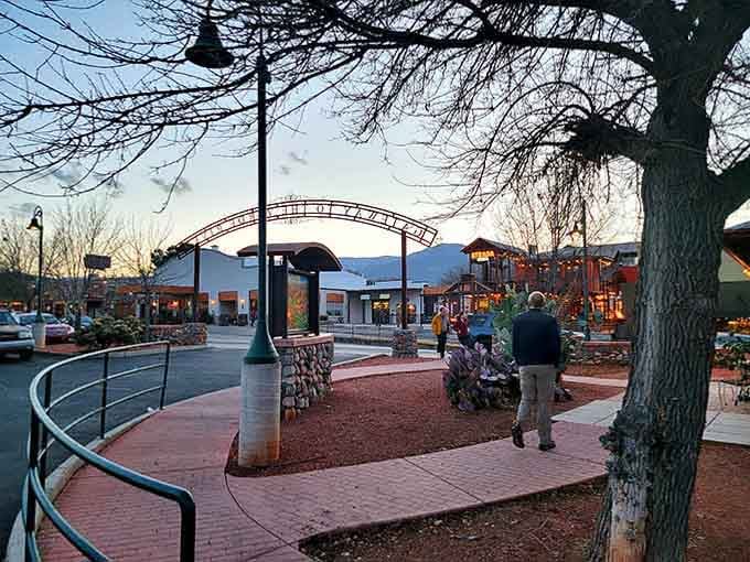Small-town charm meets mountain backdrop in this peaceful plaza where the pace slows down to exactly perfect speed.