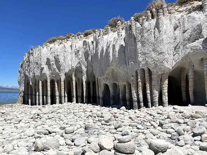 These towering stone columns rise like ancient cathedral pillars, carved by volcanic forces and revealed by patient erosion over millennia.