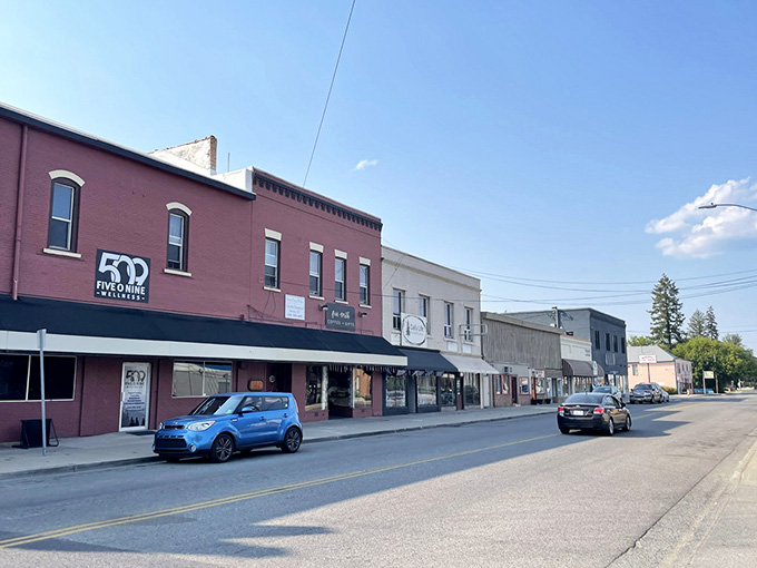 Colorful storefronts line streets where everyone waves&mdash;and they actually mean it, not that half-hearted city gesture.