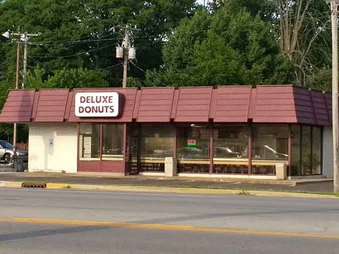 The burgundy awning shelters a neighborhood treasure, where locals have been starting their mornings right for countless happy years.